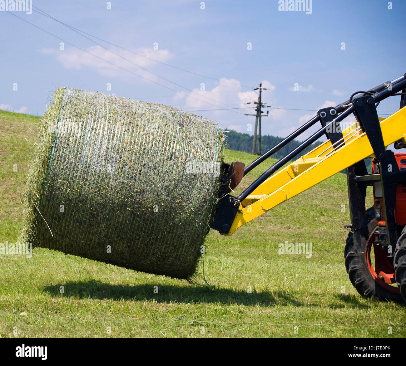 Farmer Lifting Bale Straw Tractor High Resolution Stock Photography and ...