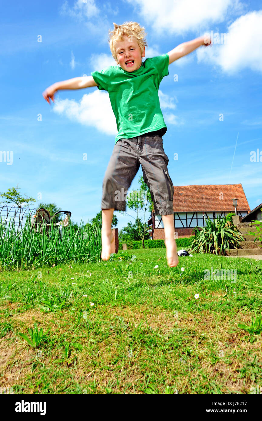 spring bouncing bounces hop skipping frisks jumping jump delighted ...
