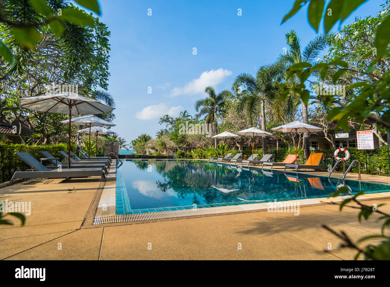 Beautiful luxury swimming pool in hotel resort Stock Photo - Alamy