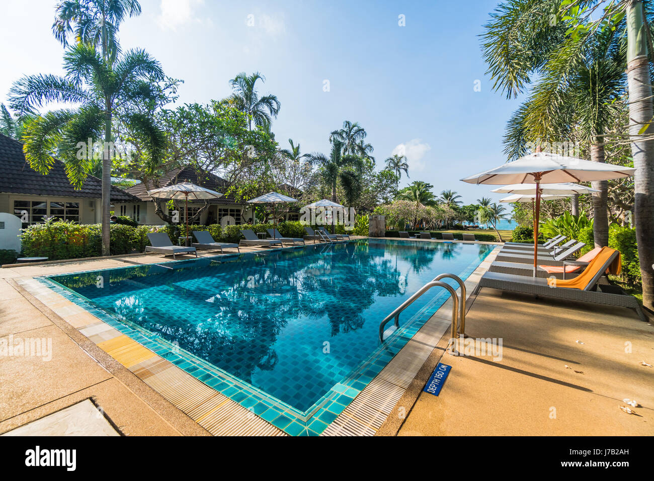 Beautiful luxury swimming pool in hotel resort Stock Photo - Alamy