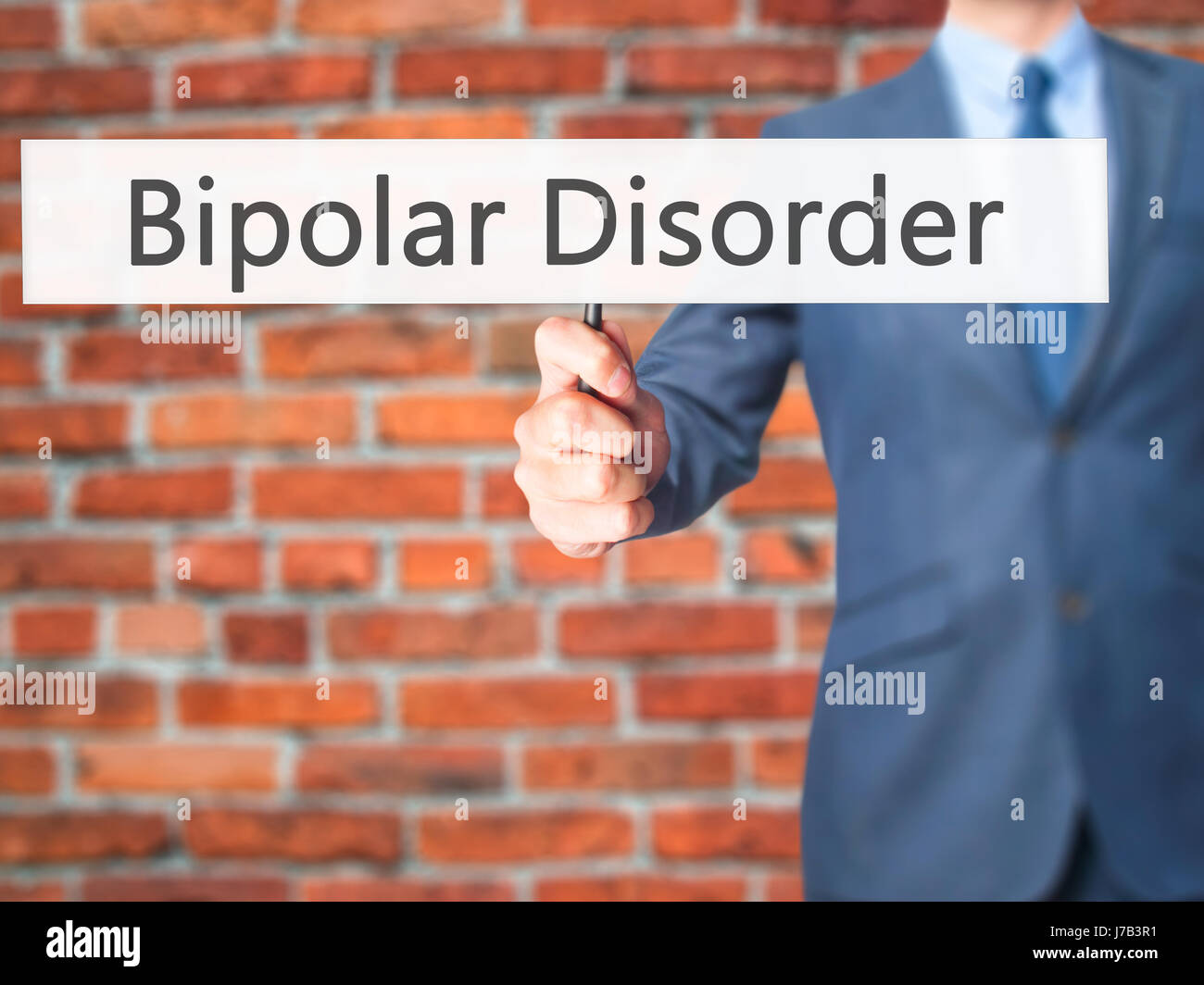 Bipolar Disorder - Businessman hand holding sign. Business, technology ...