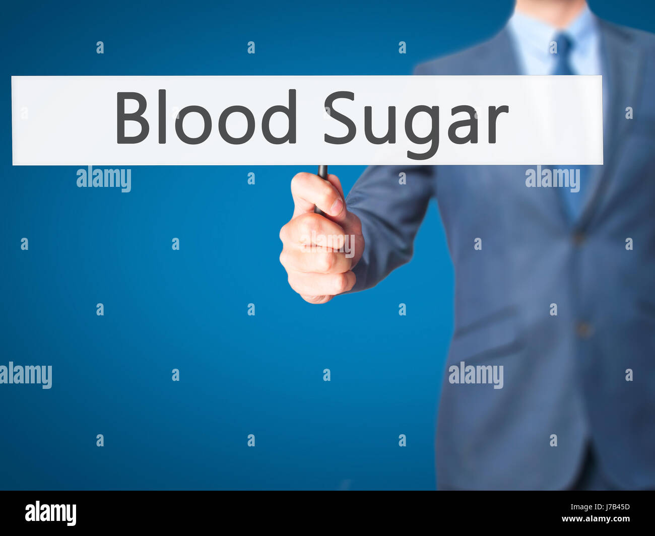 Blood Sugar - Businessman hand holding sign. Business, technology ...