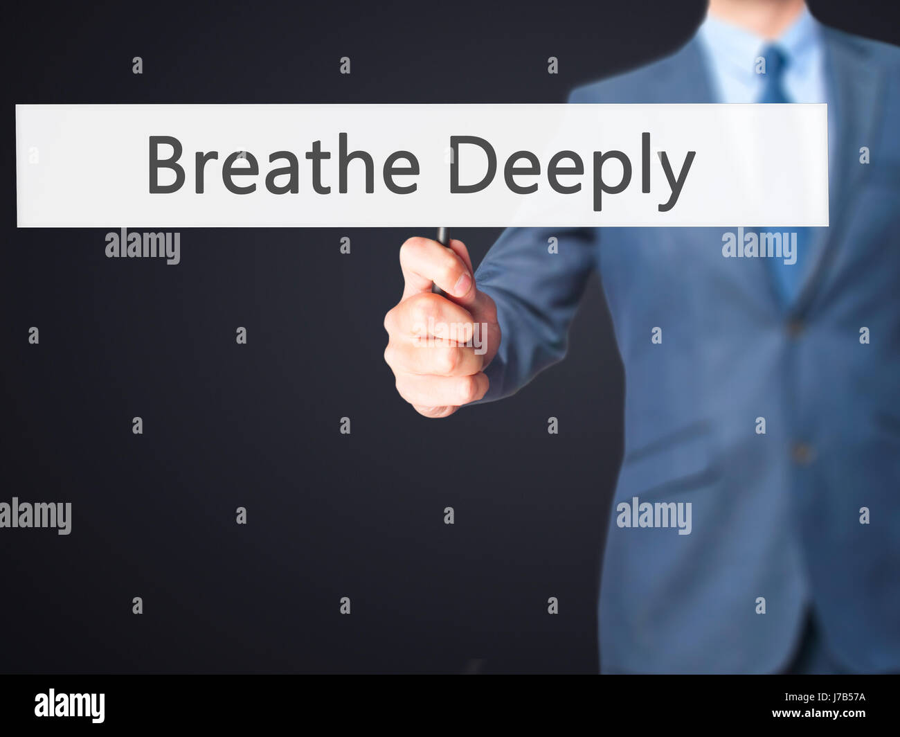 Breathe Deeply - Businessman hand holding sign. Business, technology ...