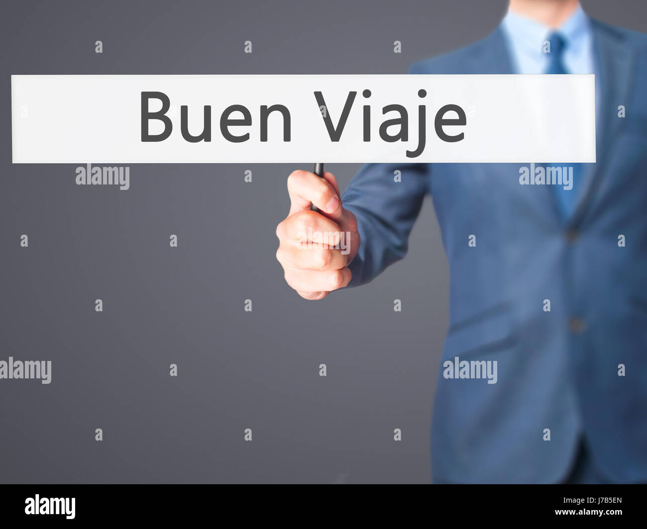 Buen Viaje (Good Trip in Spanish) - Businessman hand holding sign ...