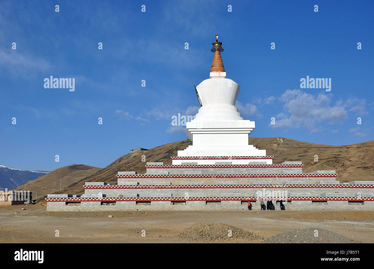 Sacred Tibetan white tower Stock Photo - Alamy
