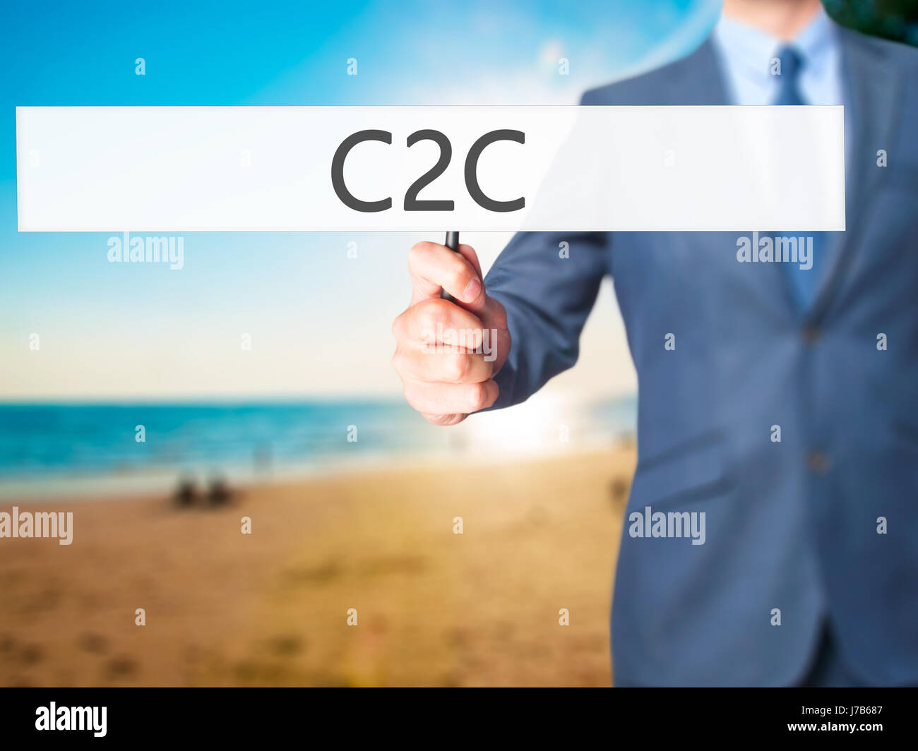 C2C - Business man showing sign. Business, technology, internet concept ...