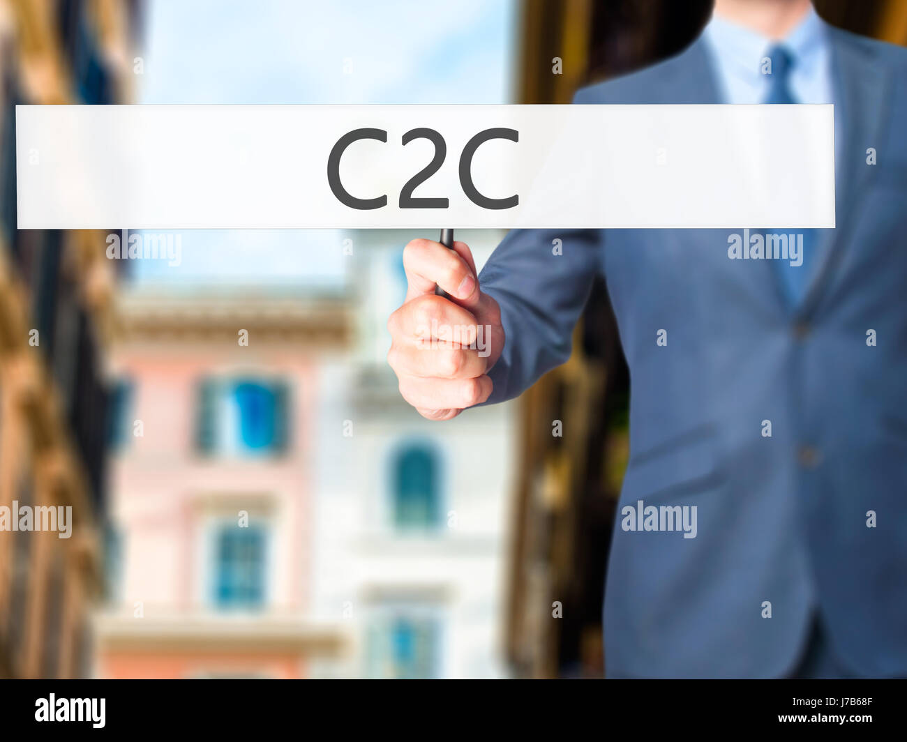 C2C - Business man showing sign. Business, technology, internet concept ...