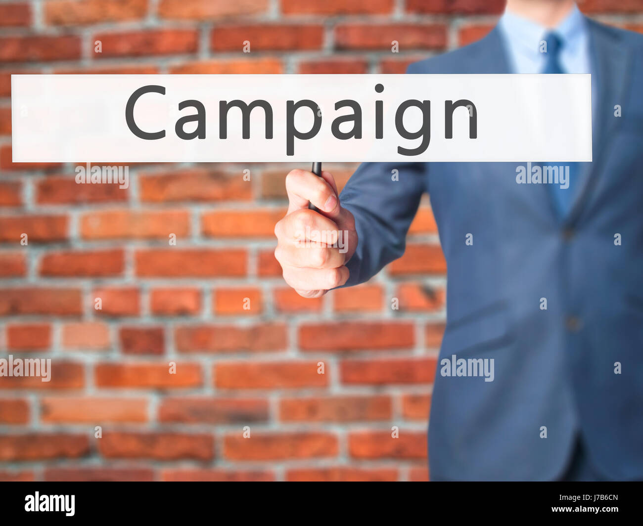 Campaign - Businessman hand holding sign. Business, technology ...
