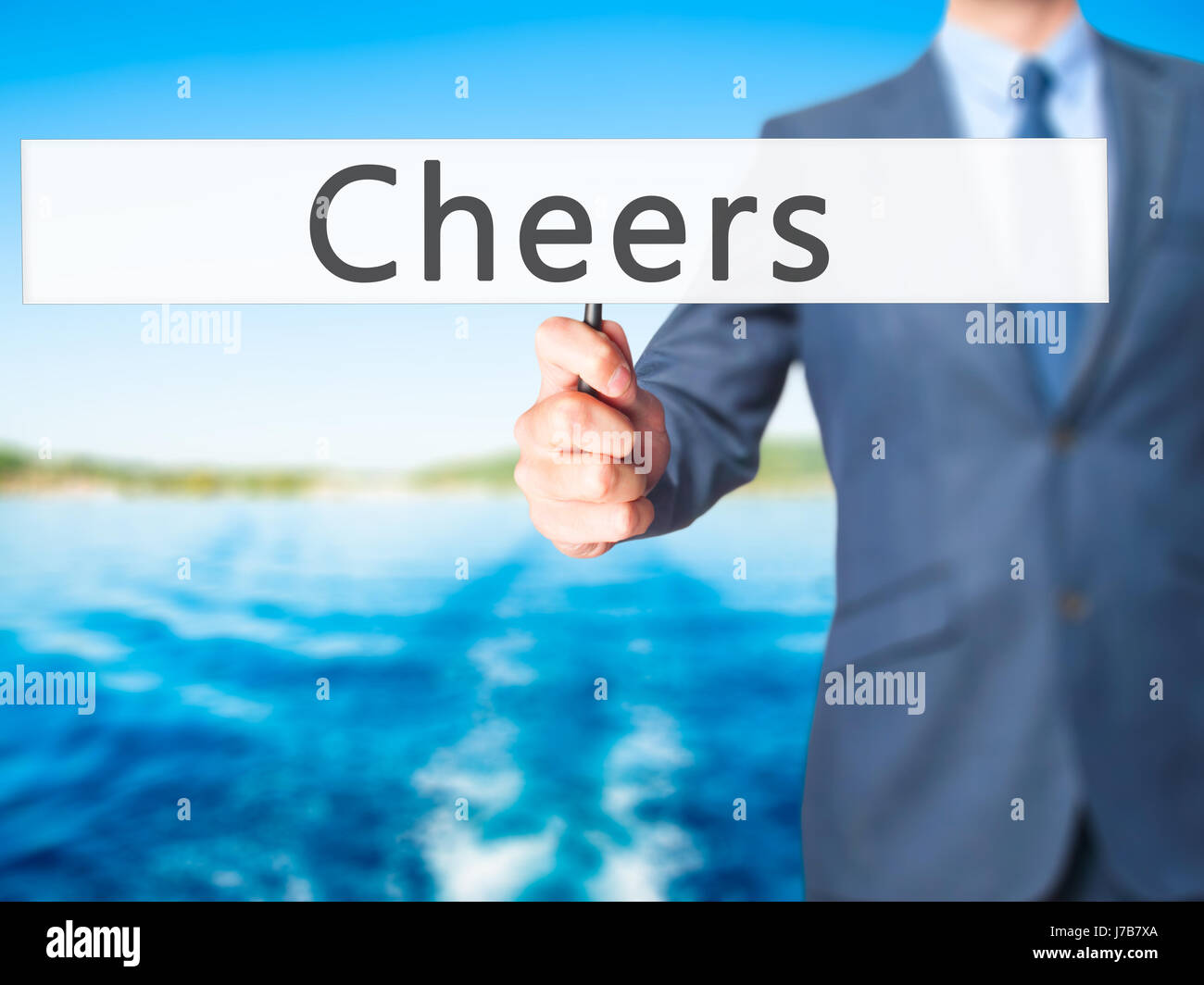 Cheers - Businessman hand holding sign. Business, technology, internet ...