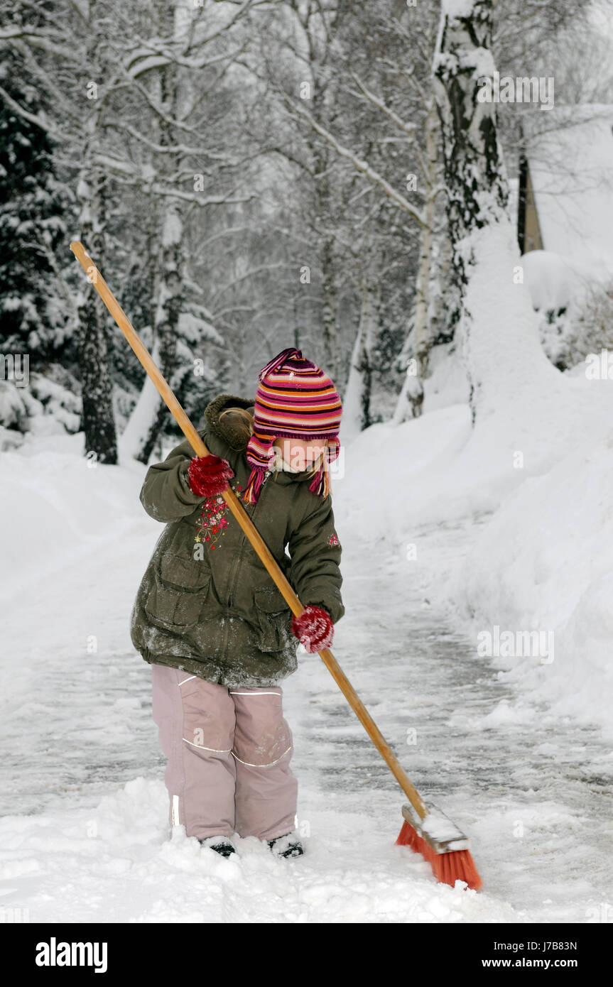 winter broom sweep snow child cold ice frost pavement smooth clean ...