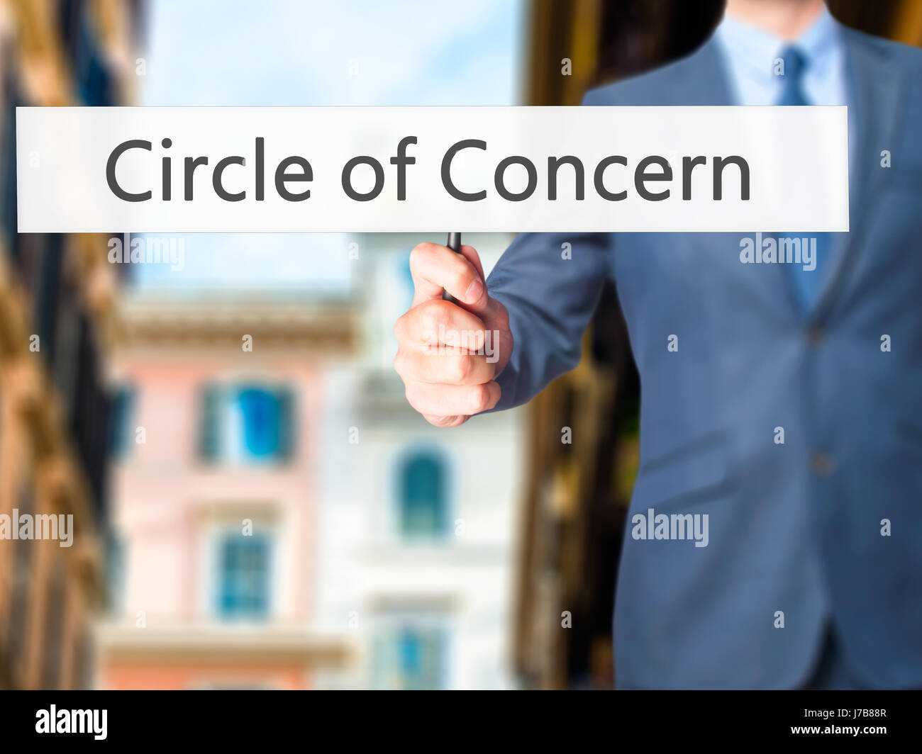 Circle of Concern - Businessman hand holding sign. Business, technology ...
