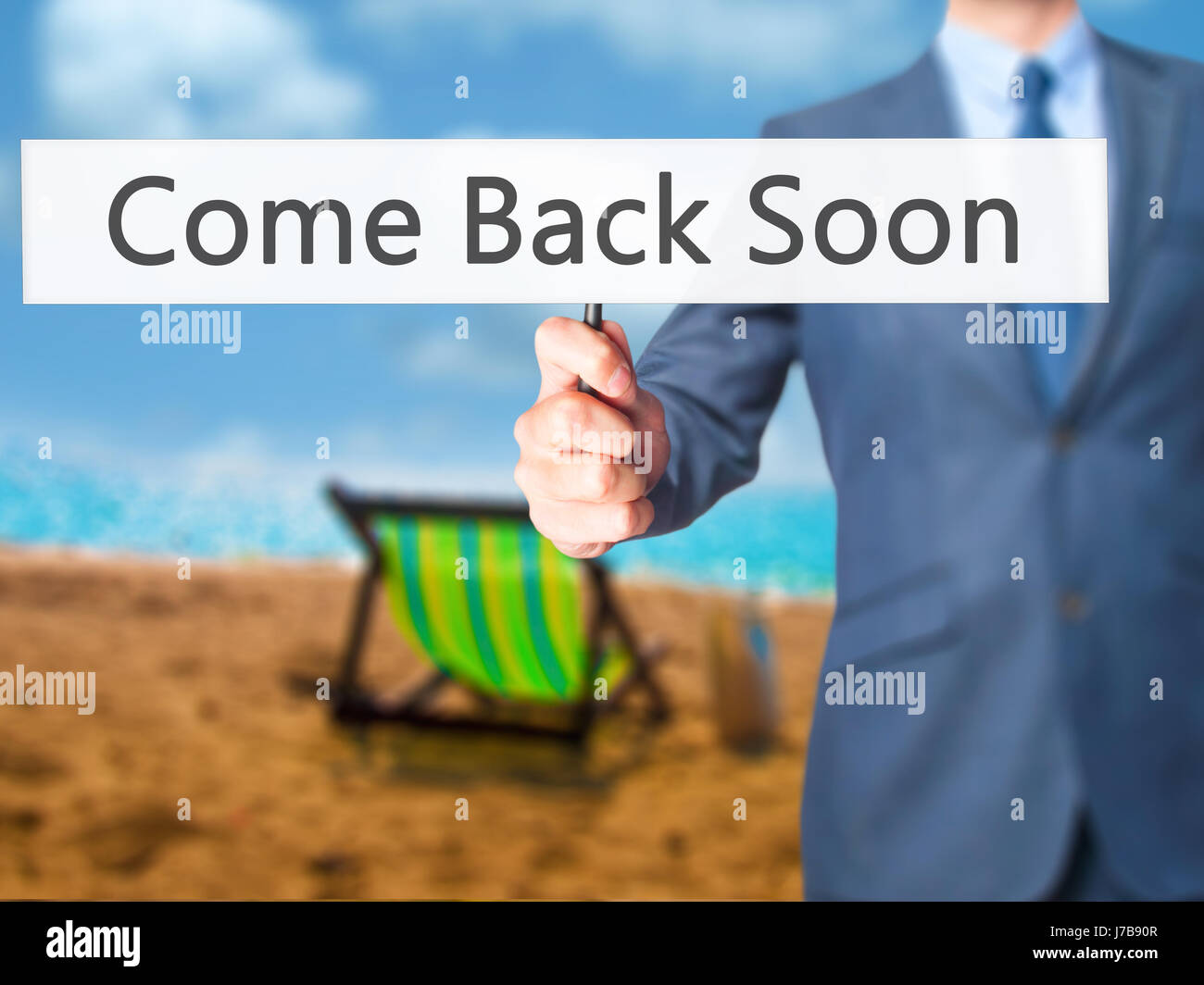Come Back Soon - Businessman hand holding sign. Business, technology ...