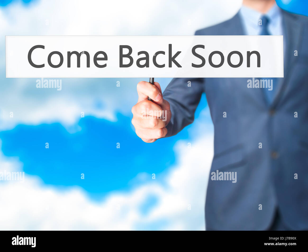 Come Back Soon - Businessman hand holding sign. Business, technology ...