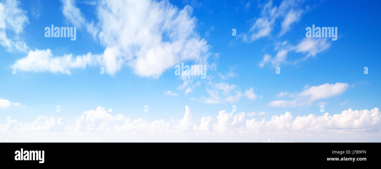 Clouds in blue sky, panoramic background texture Stock Photo - Alamy