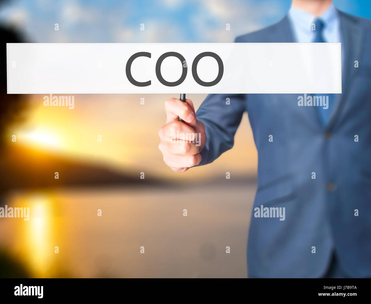 COO - Business man showing sign. Business, technology, internet concept ...