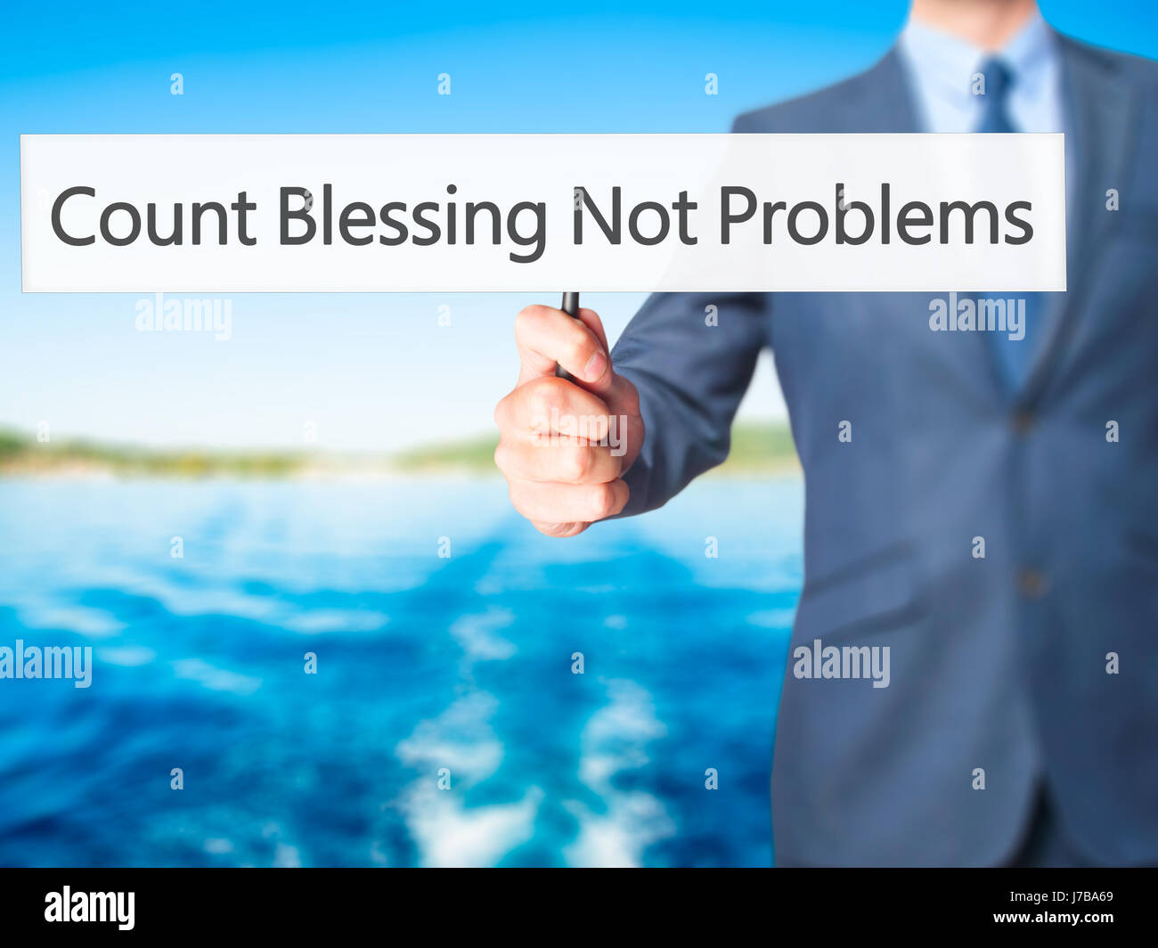 Count Blessing Not Problems - Business man showing sign. Business ...
