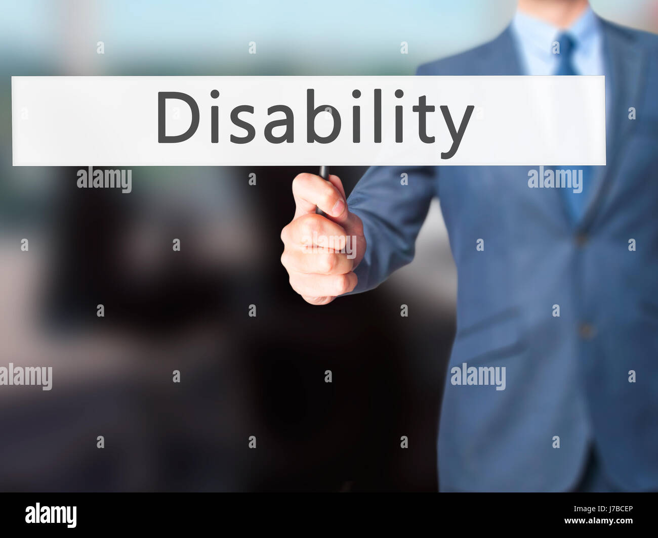 Disability - Businessman hand holding sign. Business, technology ...