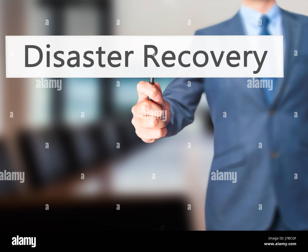 Disaster Recovery - Businessman hand holding sign. Business, technology ...
