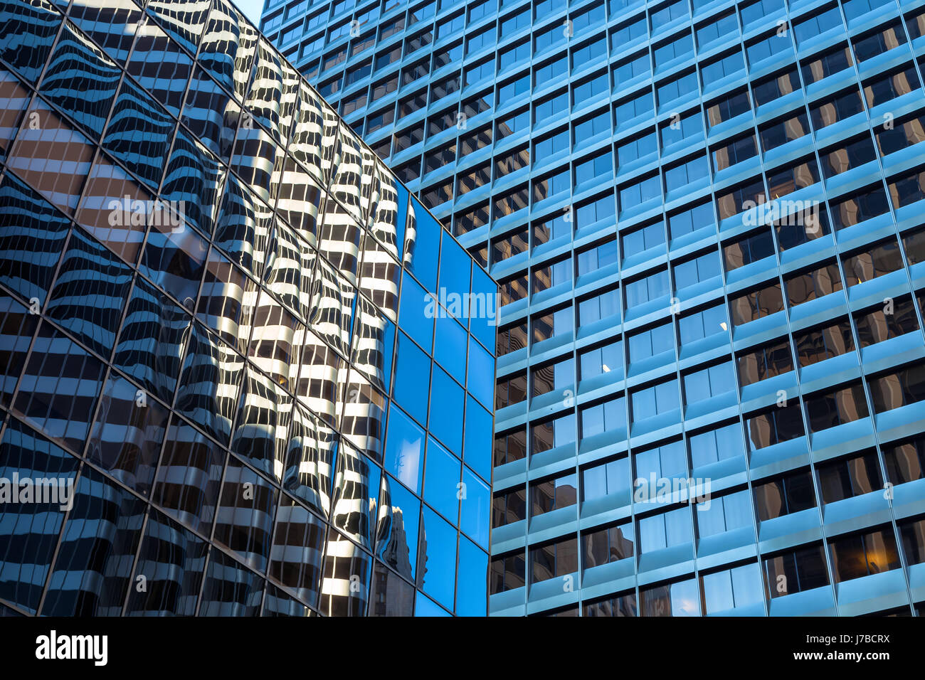 light reflections on the glass windows of the high rises in San ...