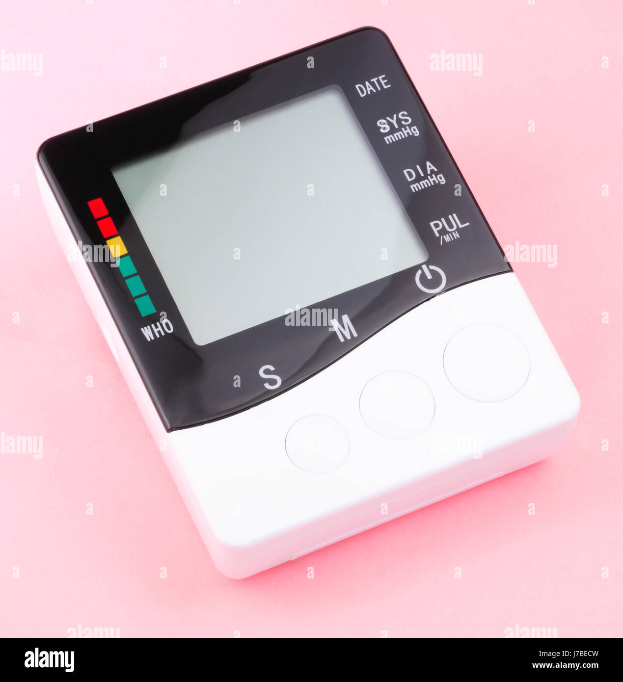 blood pressure monitor on pink background Stock Photo - Alamy