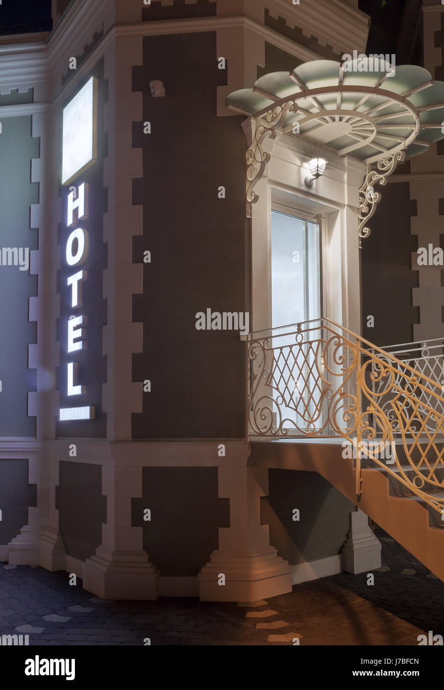 Exterior of a modern and new luxury hotel, night scene Stock Photo - Alamy
