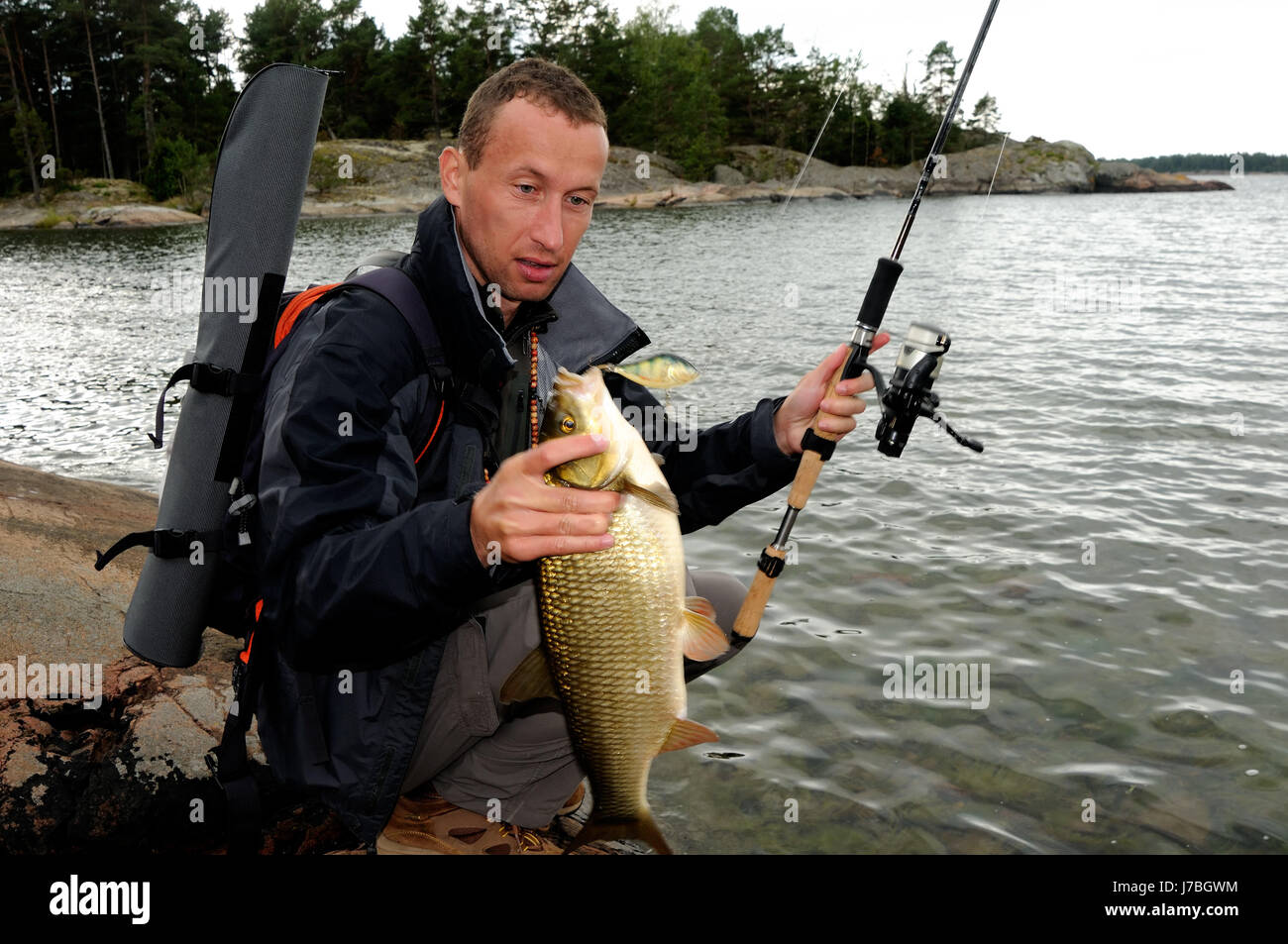 fishing fisherman angler detail sport sports flow stone male masculine ...