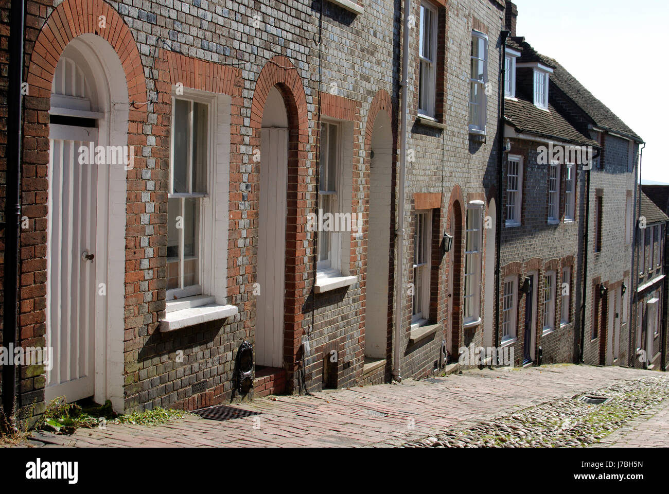 Road with brick buildings hi-res stock photography and images - Alamy