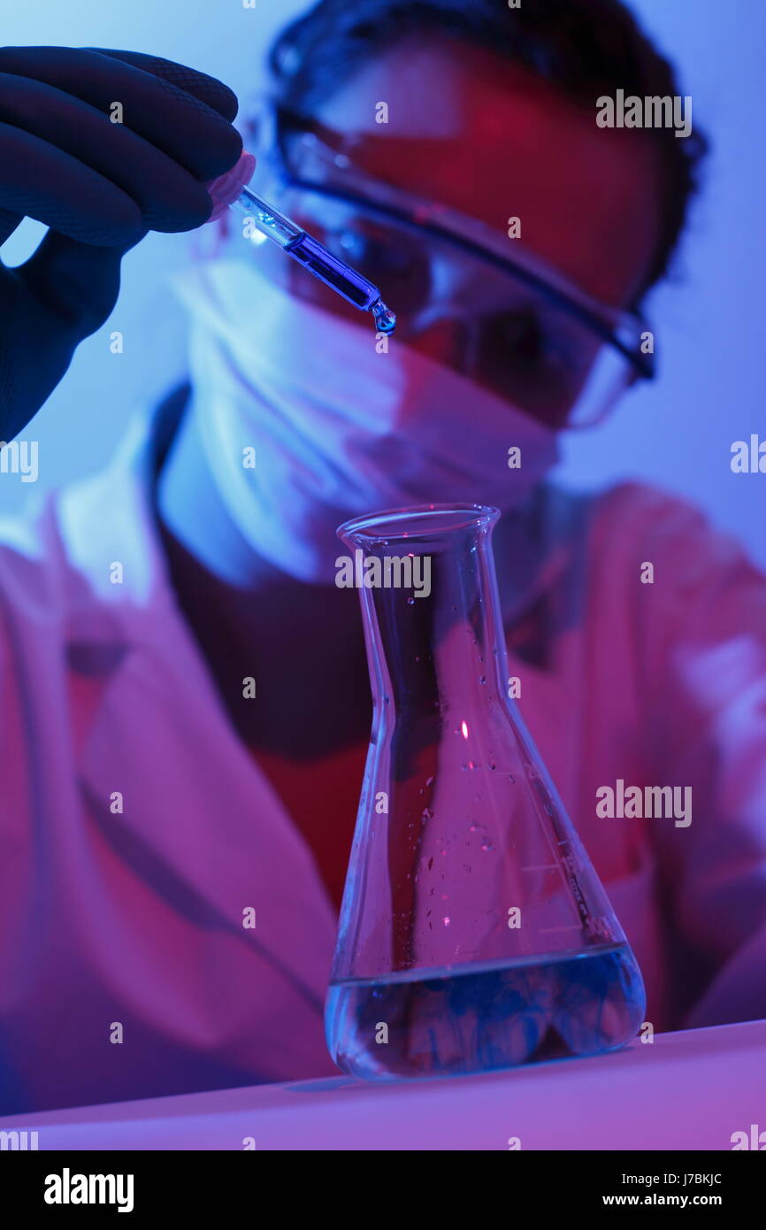 vessel test tube piston laboratory chemistry mix cob smock woman blue ...