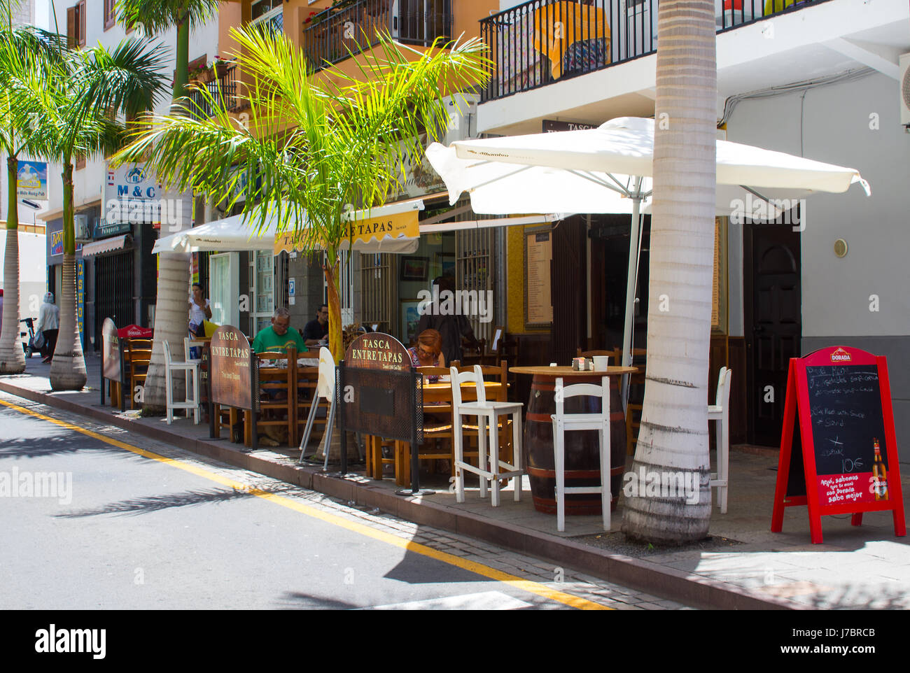 A typical atmospheric Spanish restaurant and cafe with on street and ...