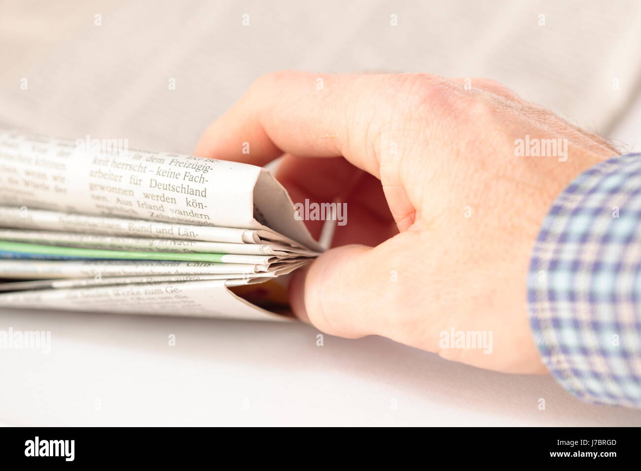newspaper journal hand hold news data informations substratums facts ...