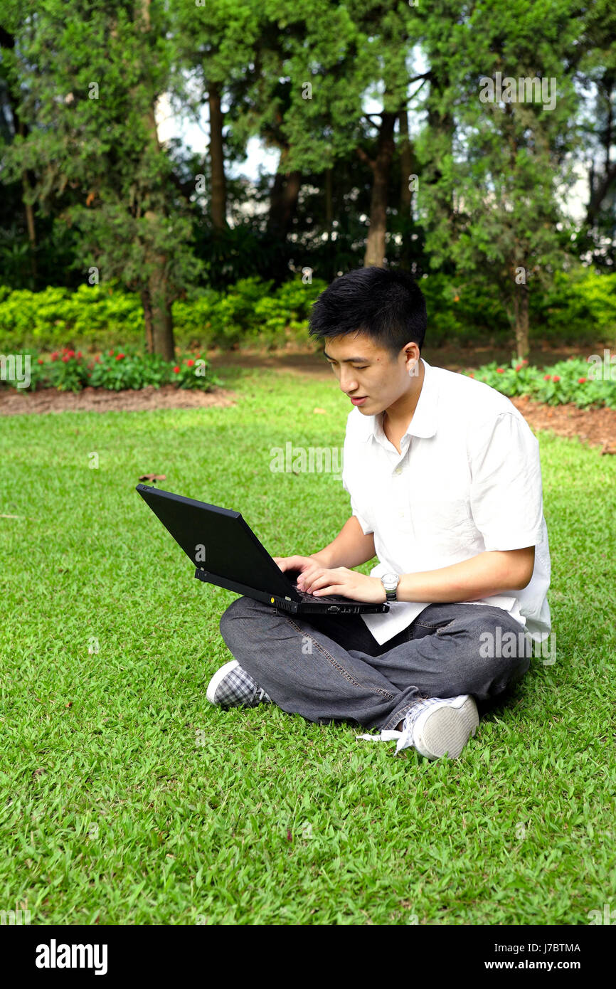 outdoor asian computers computer man blue humans human beings people ...