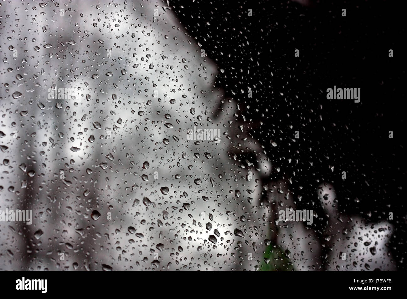 raindrop disc hazy window water dark drop drip drops seeping sopping ...