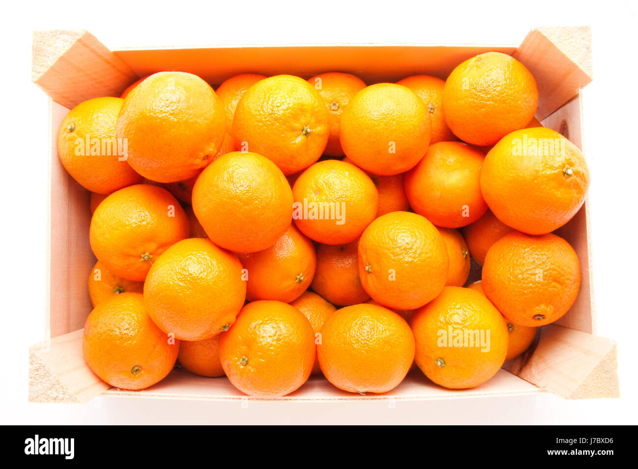 mandarins in box against white background Stock Photo - Alamy