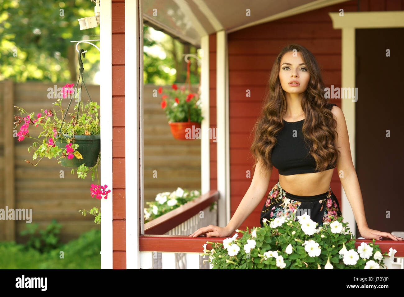 Beautiful girl at summer terrace Stock Photo - Alamy