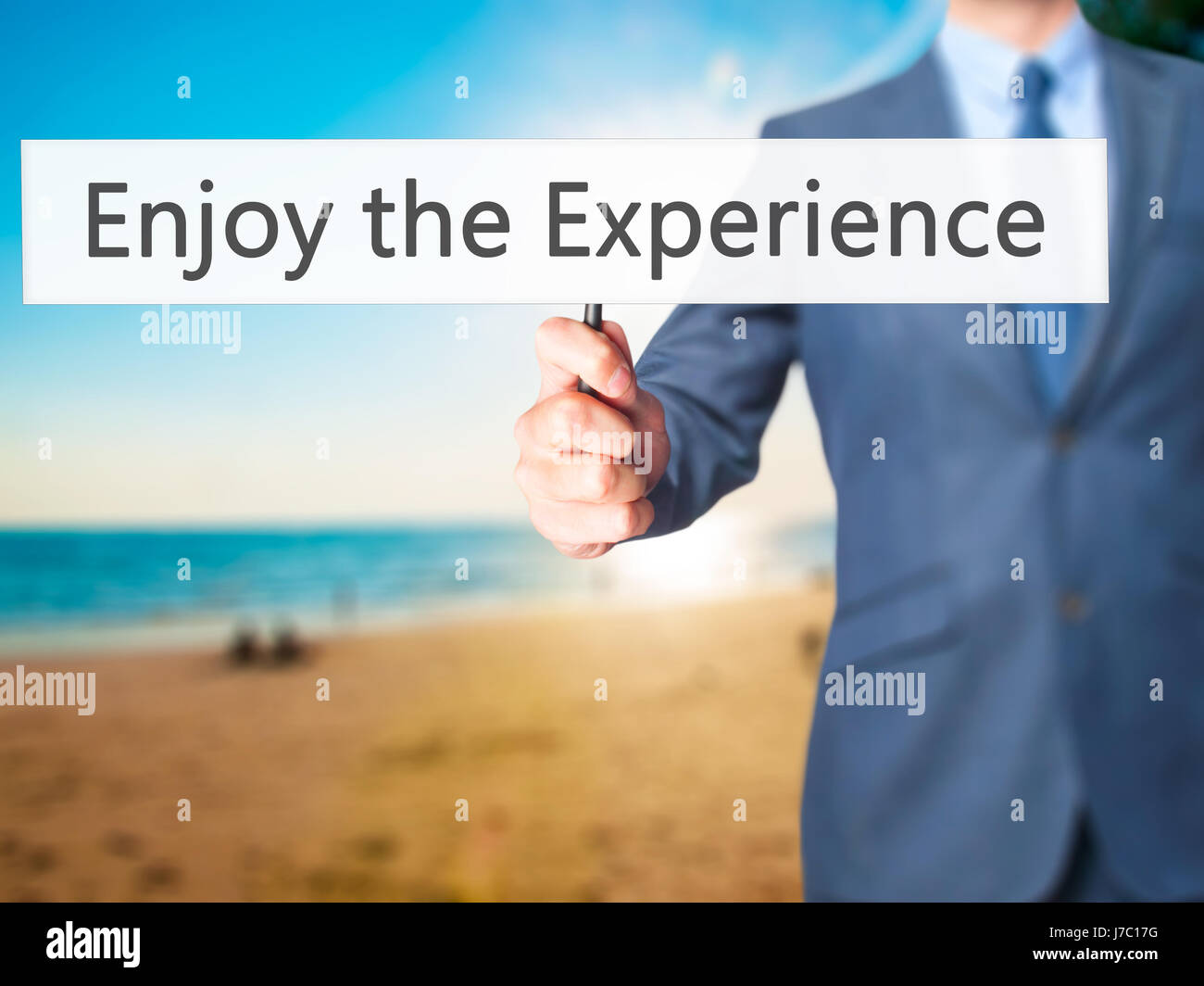 Enjoy the Experience - Businessman hand holding sign. Business ...