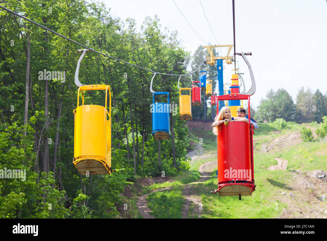 young loving happy couple in cable car ropeway Stock Photo - Alamy