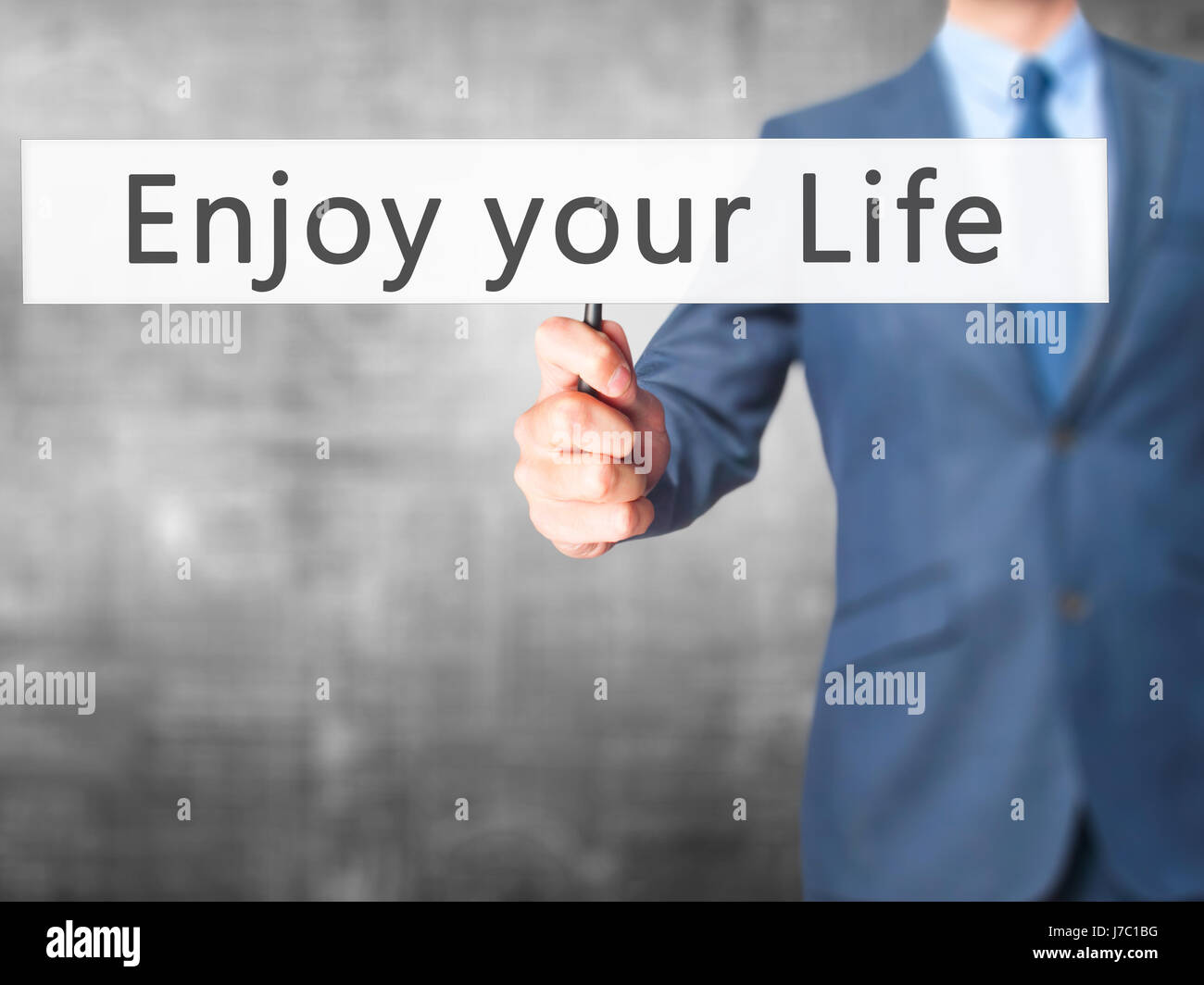 Enjoy your Life - Businessman hand holding sign. Business, technology ...