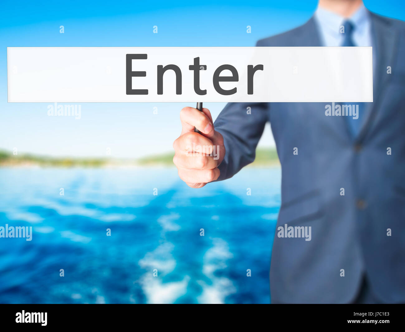 Enter - Businessman hand holding sign. Business, technology, internet ...