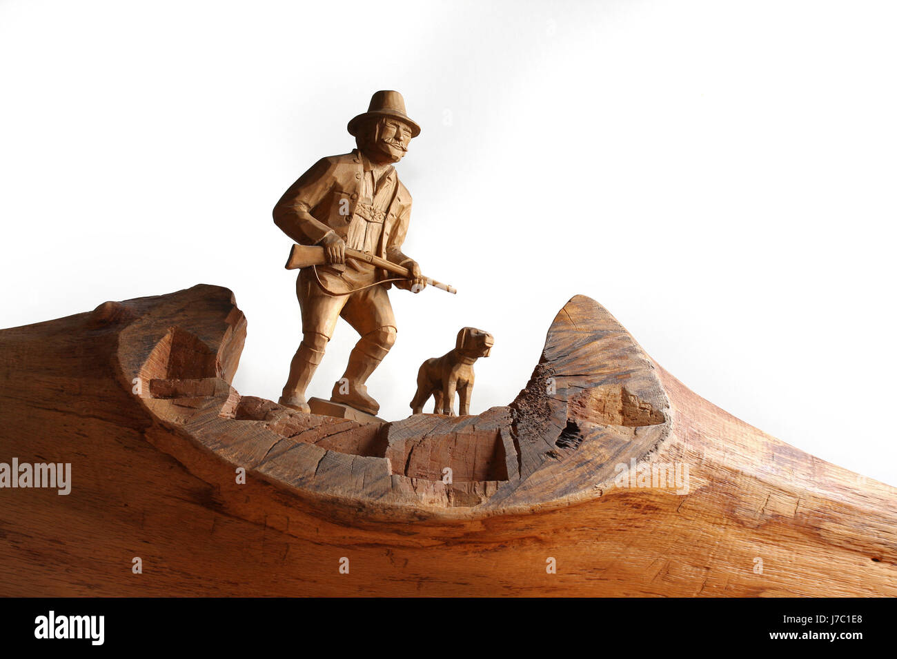 hunter and dog - wood carving Stock Photo - Alamy