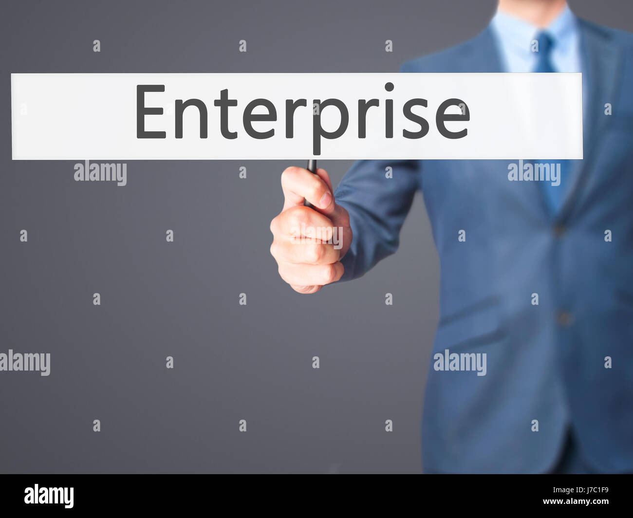 Enterprise - Businessman hand holding sign. Business, technology ...