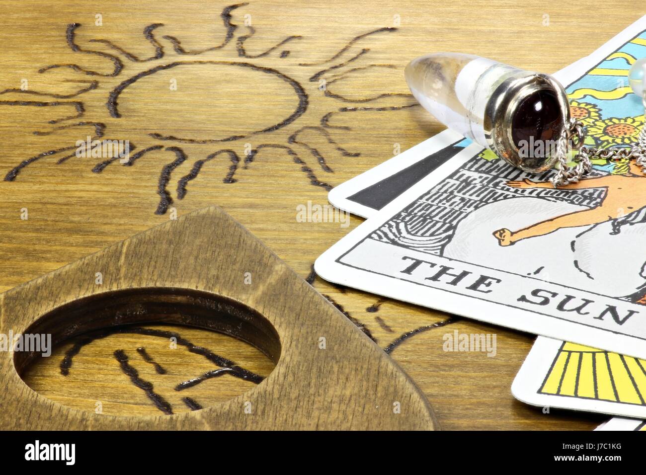 the sun shown by fortune telling accessories Stock Photo - Alamy