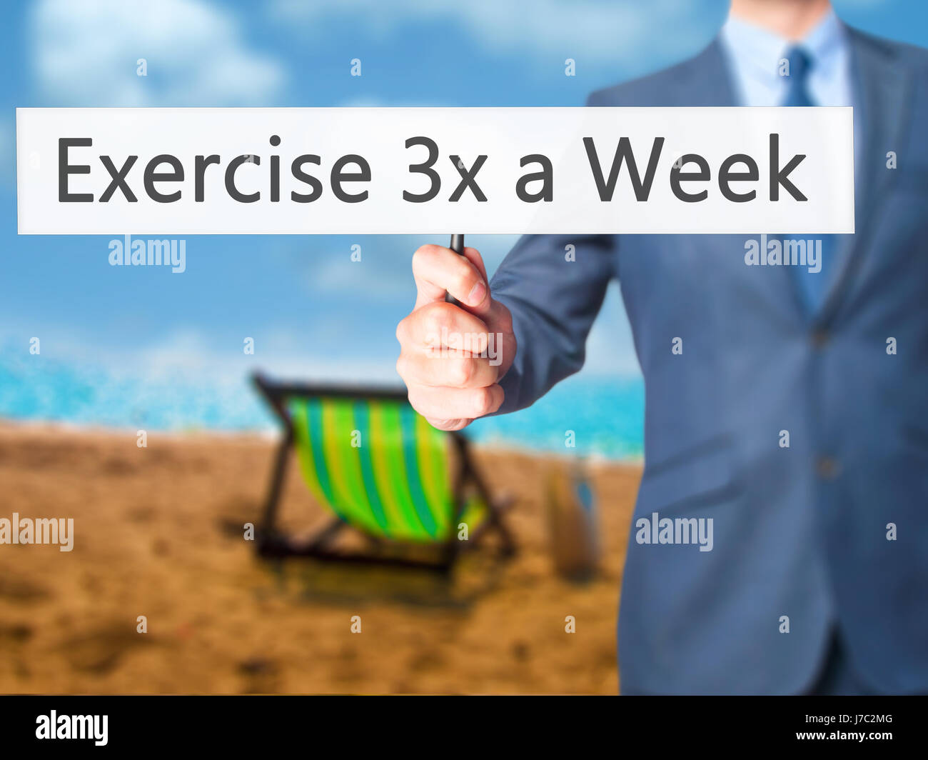 Exercise 3x a Week - Businessman hand holding sign. Business ...