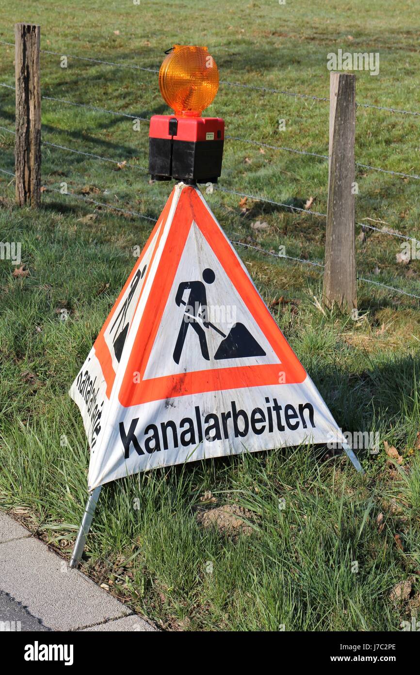 German road sign: construction site - working at sewer system Stock ...
