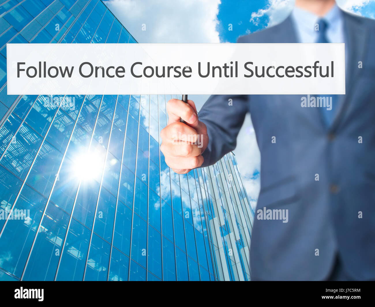 Follow Once Course Until Successful - Businessman hand holding sign ...