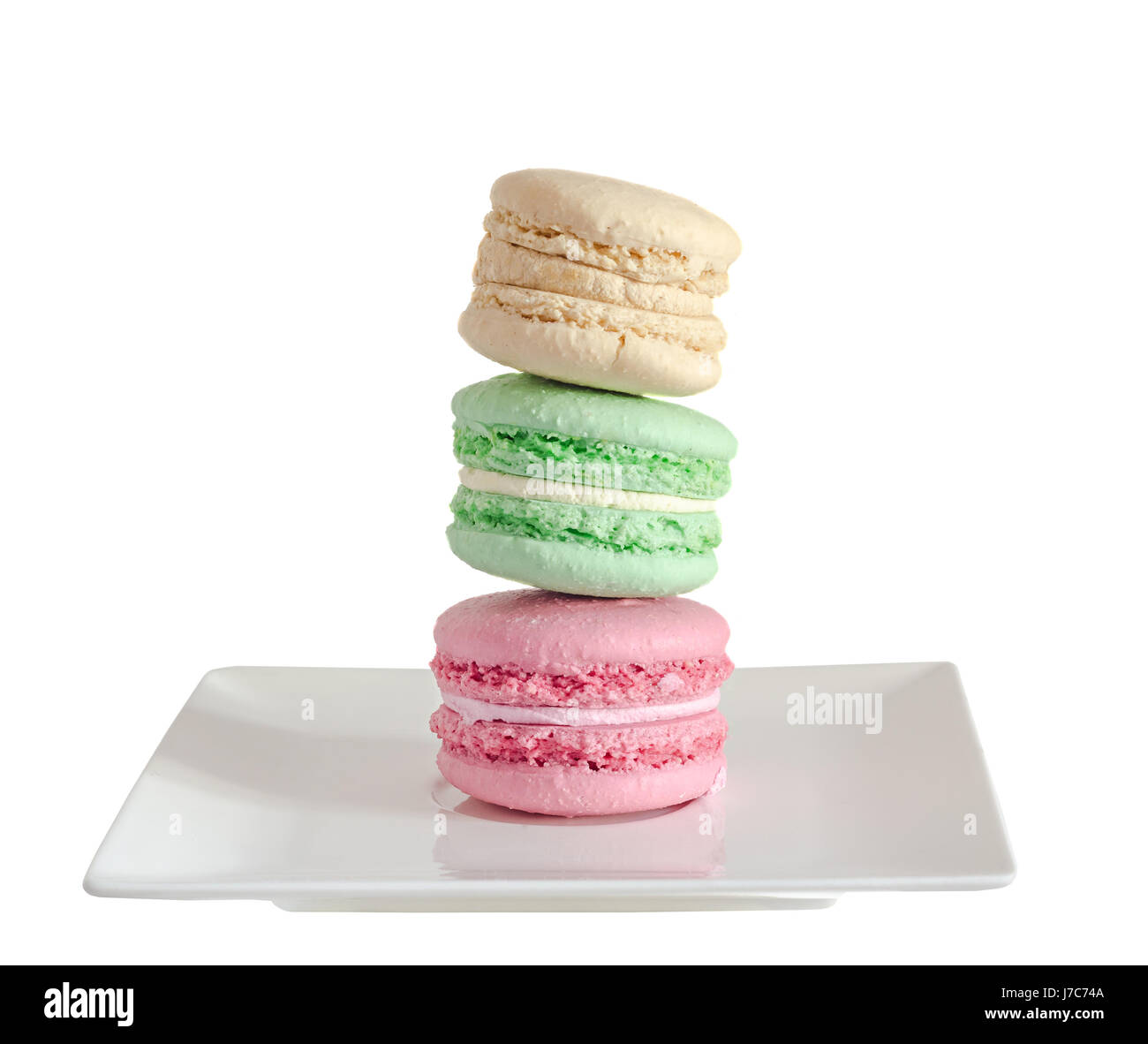 Multi colored sweet macaroons, french traditional, cream, white plate ...