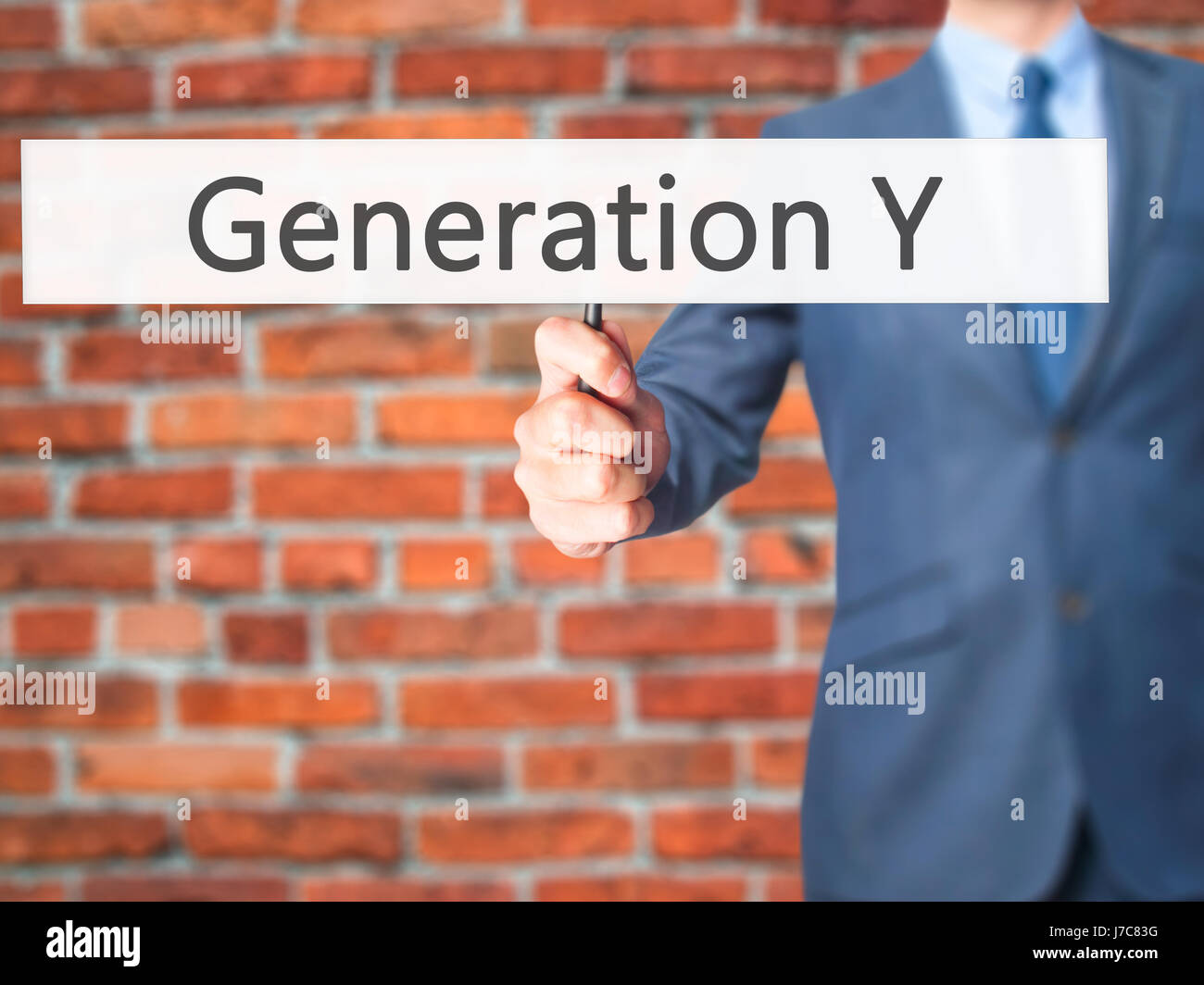 Generation Y - Businessman hand holding sign. Business, technology ...