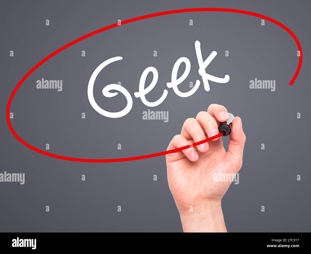 Man Hand writing Geek with black marker on visual screen. Isolated on ...