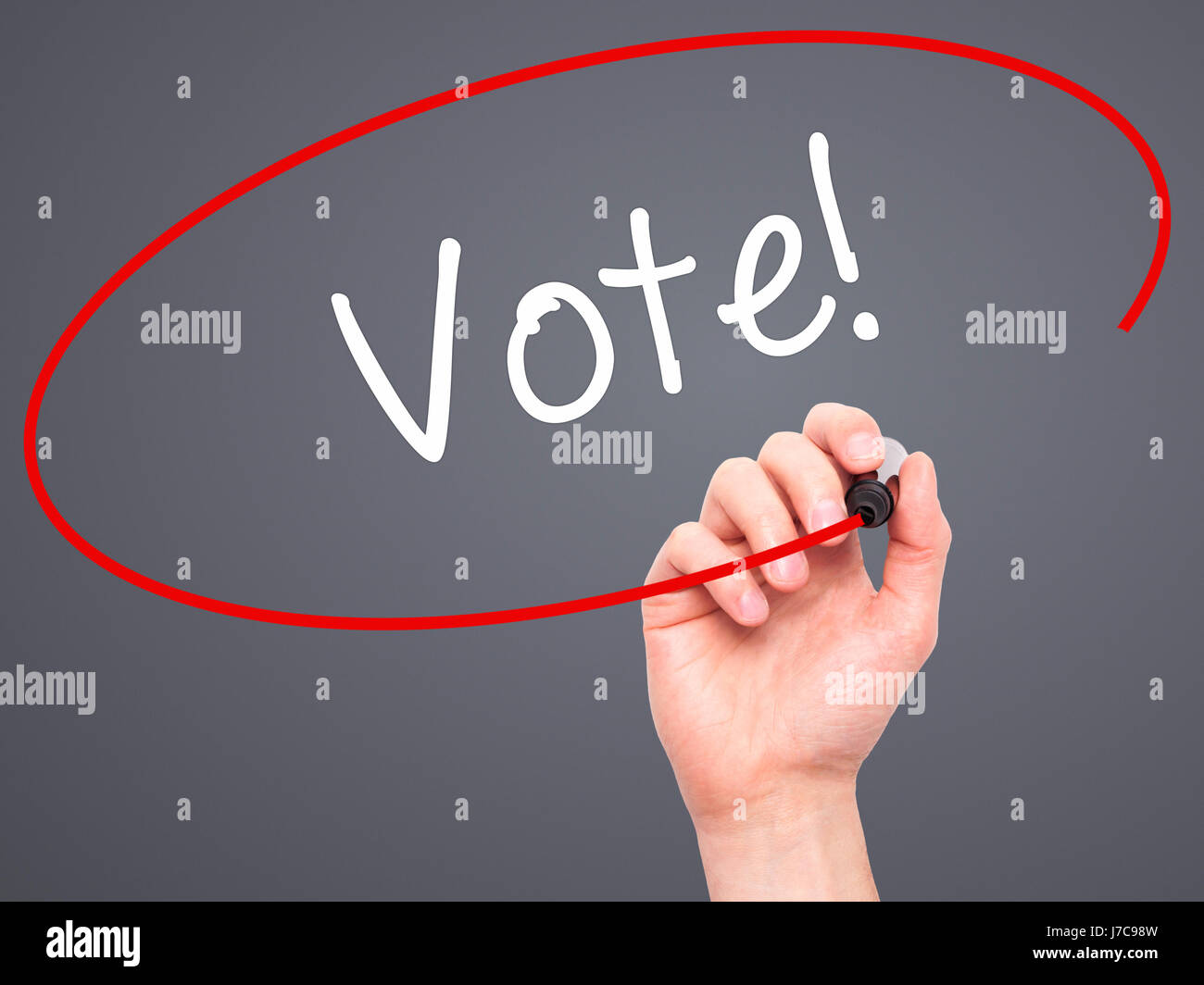 Man Hand writing Vote! with black marker on visual screen. Isolated on ...
