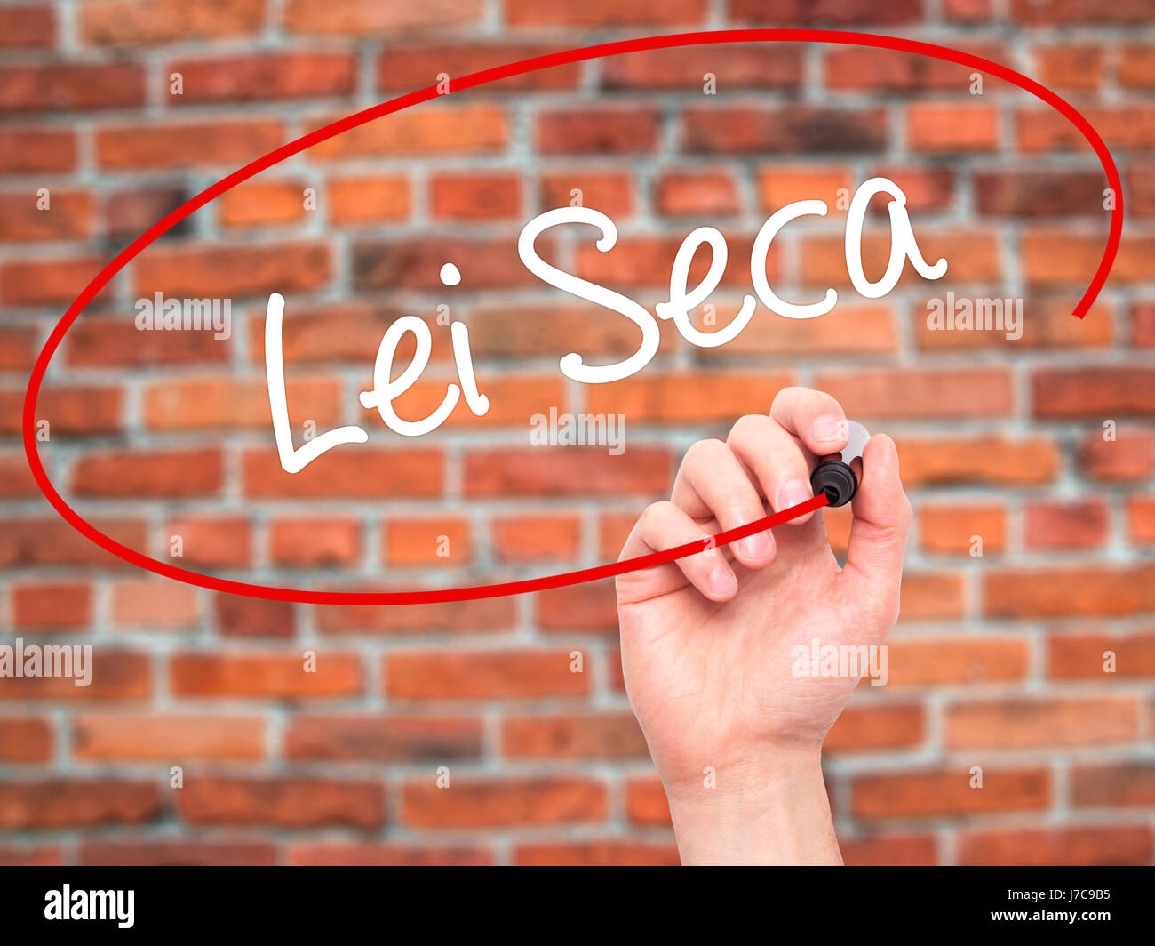 Man Hand writing Lei Seca (Prohibition Alcohol Law n Portuguese) with ...