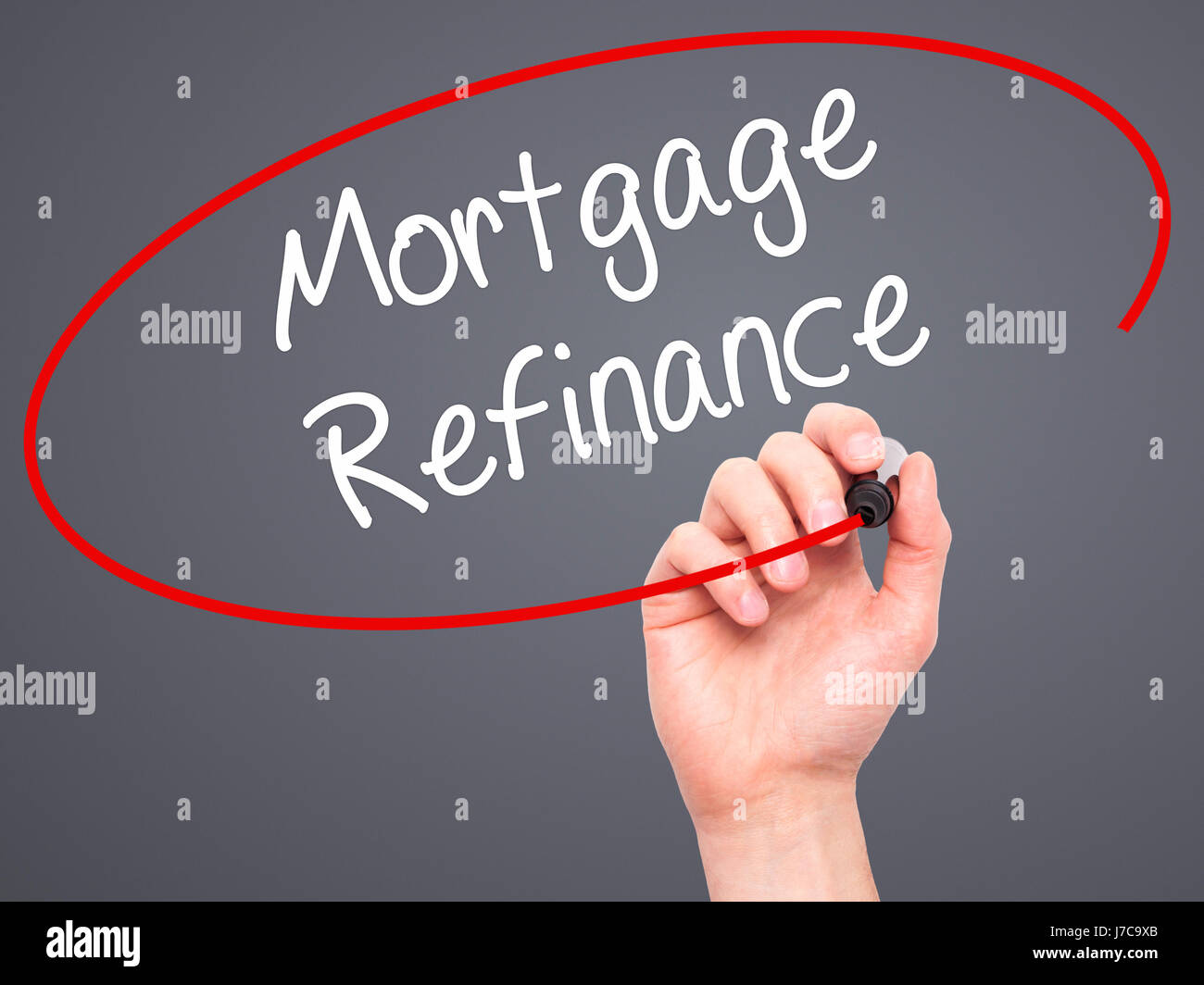 Man Hand writing Mortgage Refinance with black marker on visual screen ...